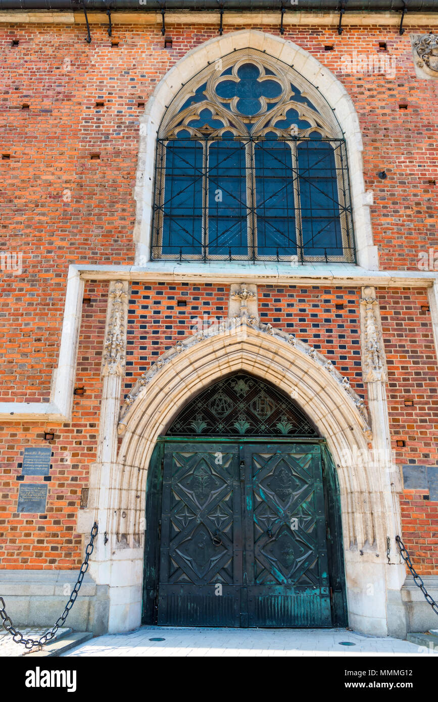 entrance to the brick catholic church massive metal gates Stock Photo ...