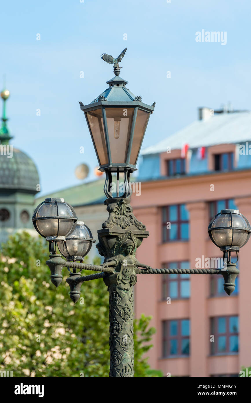 lamppost wrought iron in vintage style on a street in a European city ...
