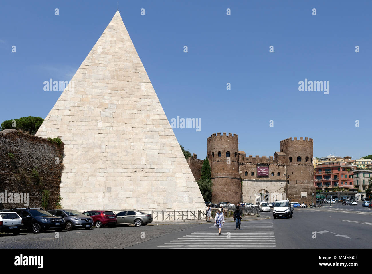 The Pyramid of Caius Cestius and the twin towered Porta San Paolo in ...