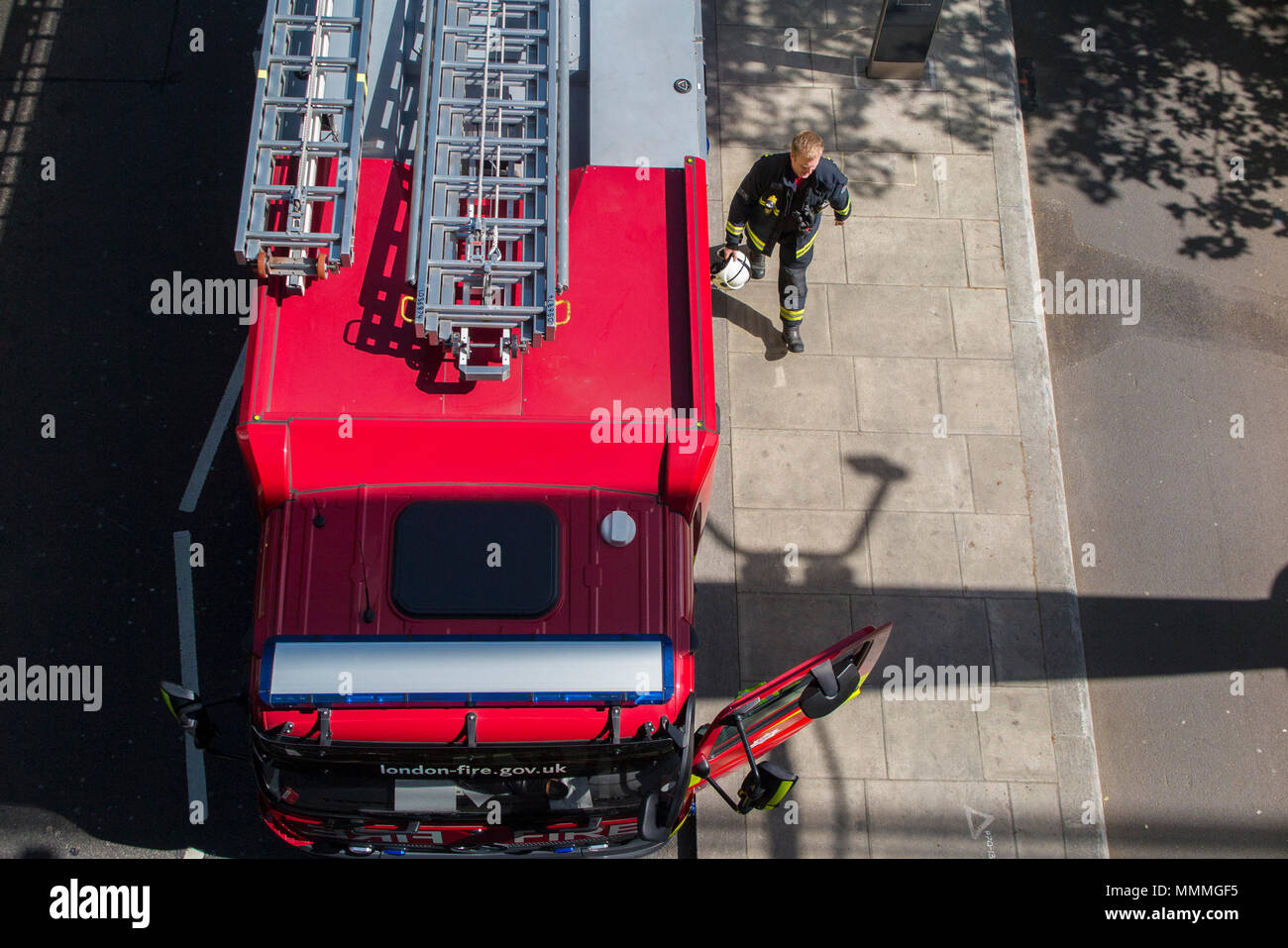 Looking down onto a fire engine attending an emergency Stock Photo - Alamy