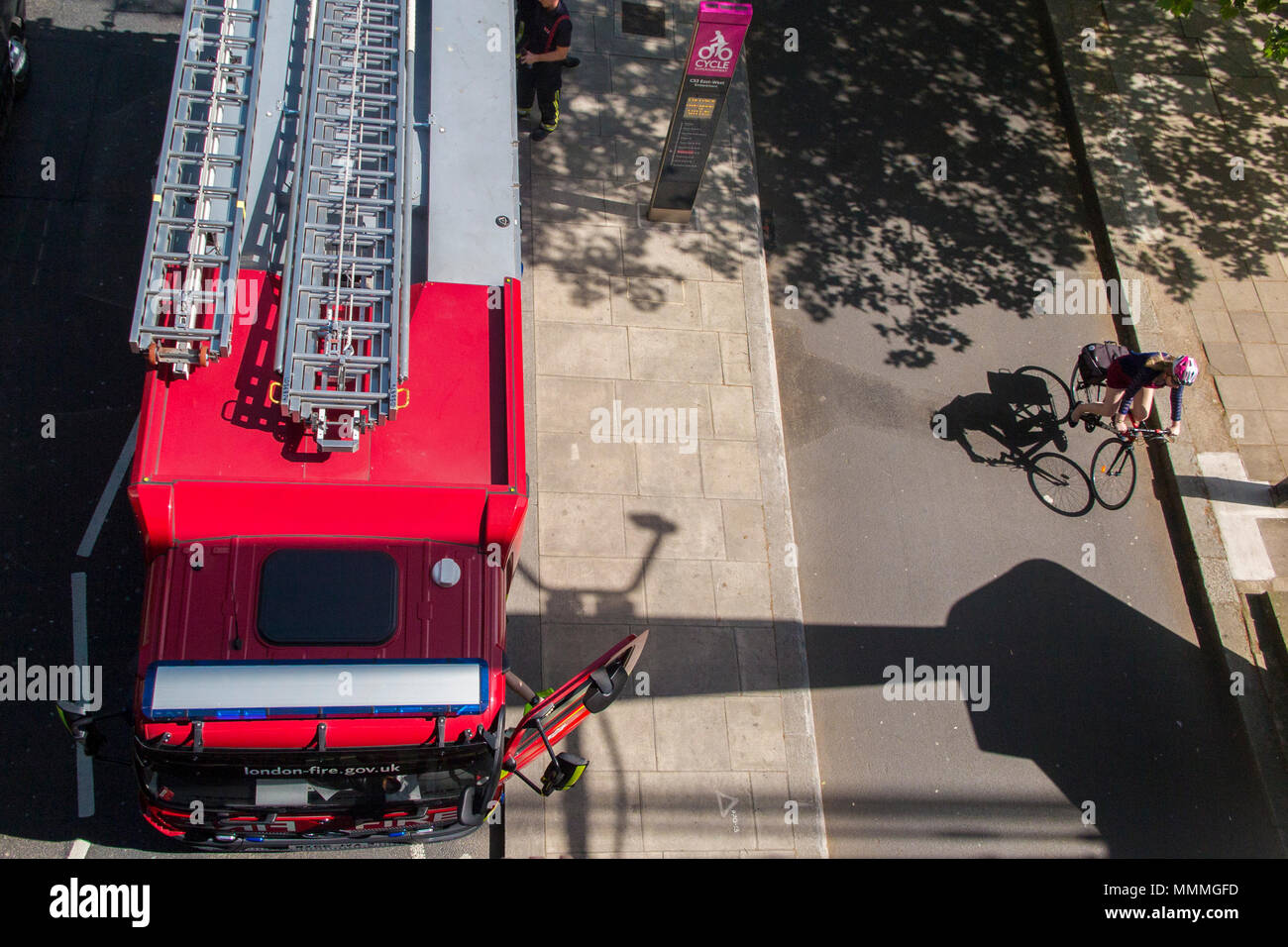 Firefighters on ladders hi-res stock photography and images - Alamy