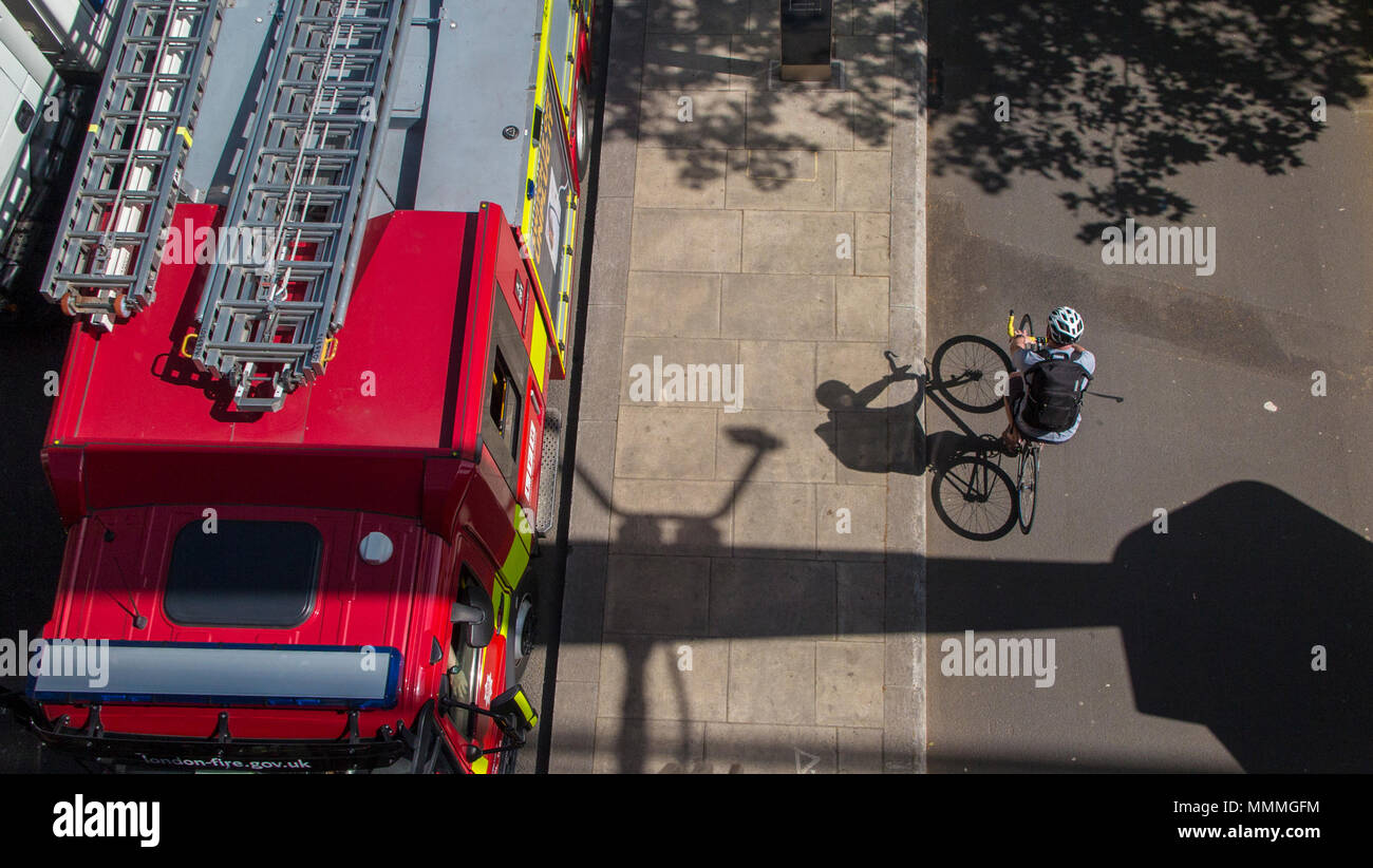 Firefighters on ladders hi-res stock photography and images - Alamy