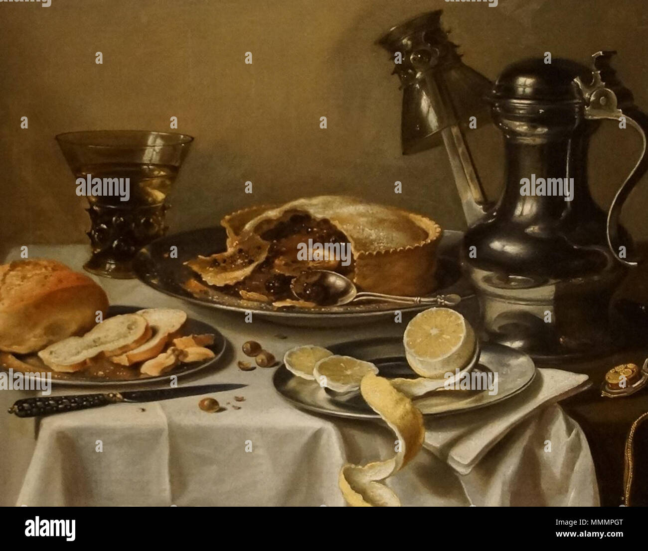 . English: A breakfast still life with bread, a sliced and peeled lemon ...