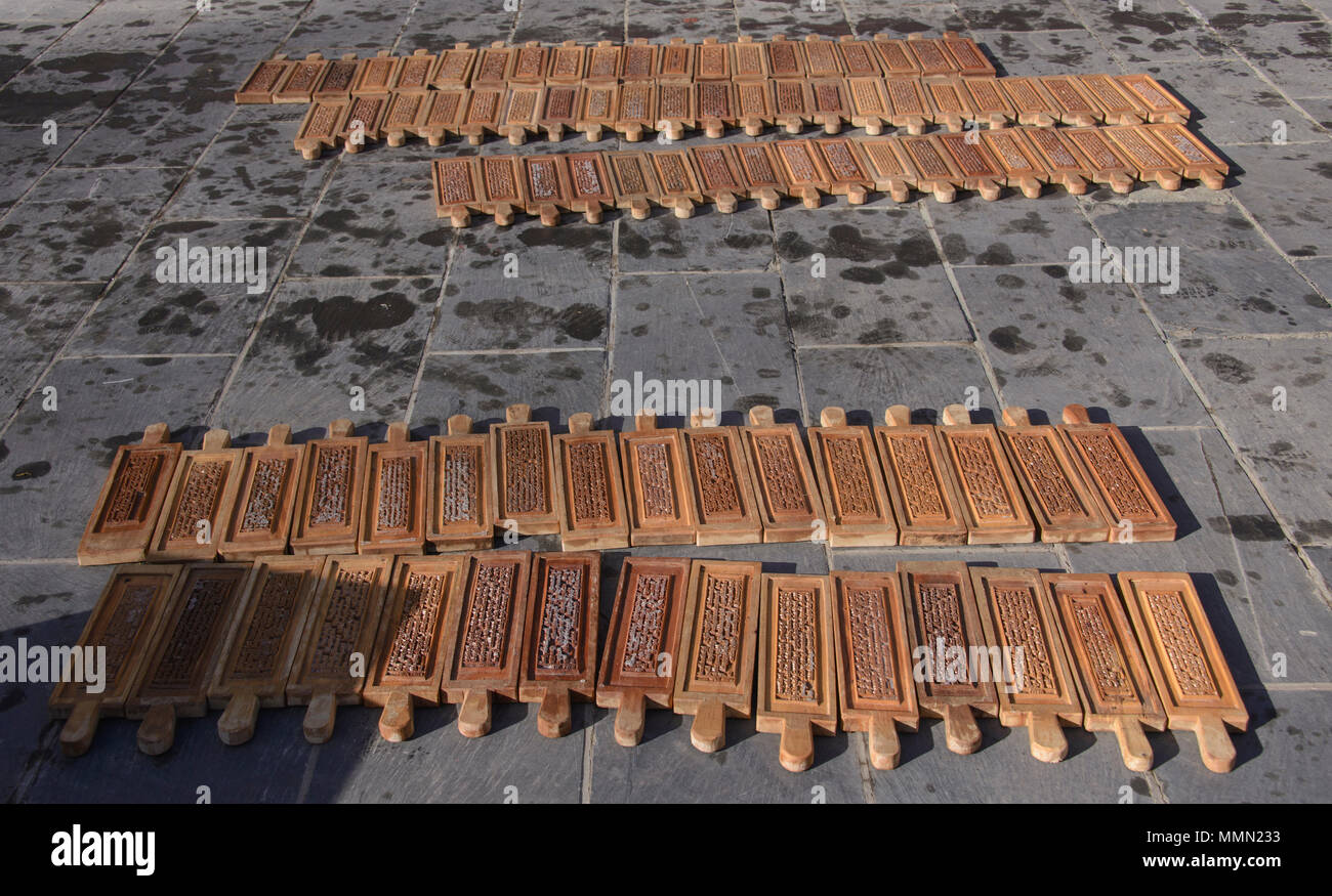 Tibetan woodblock prints at the holy Bakong Scripture Printing Press ...