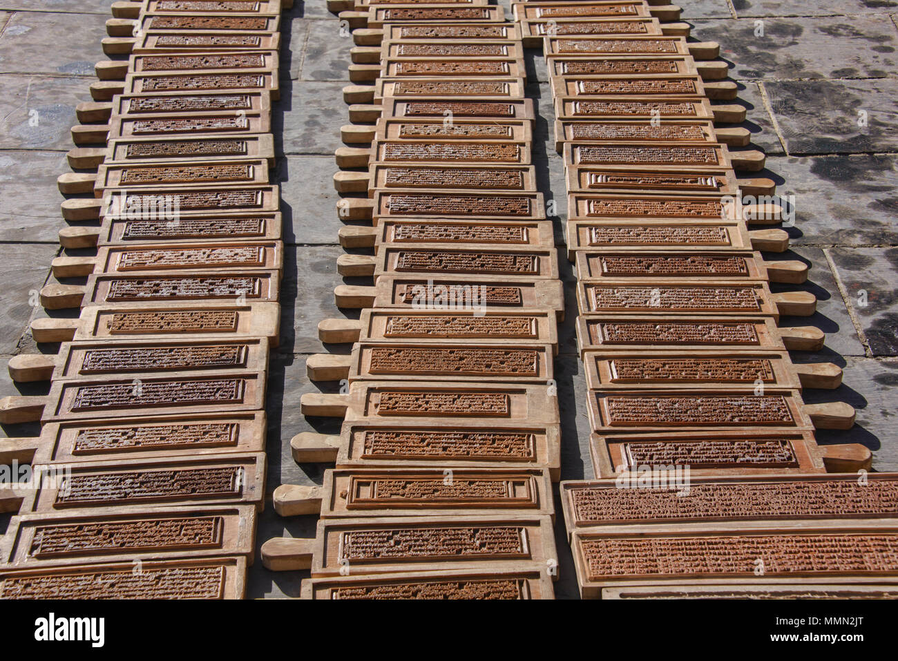 Tibetan woodblock prints at the holy Bakong Scripture Printing Press ...