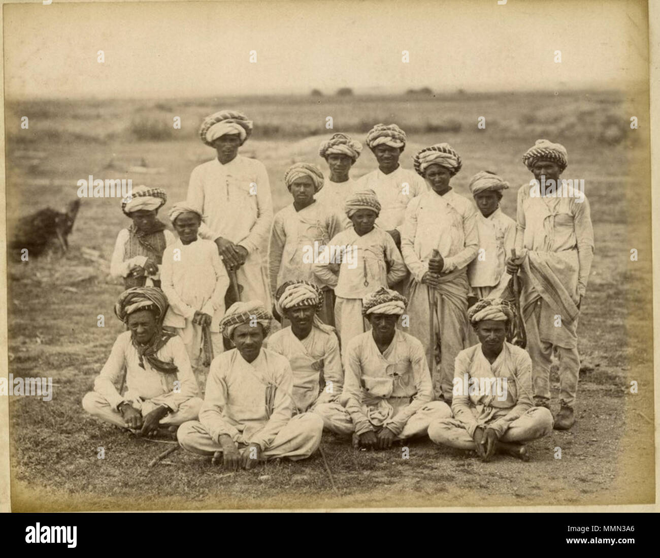 . English: A group of Bheel men and boys; an albumen photo, c.1880's ...
