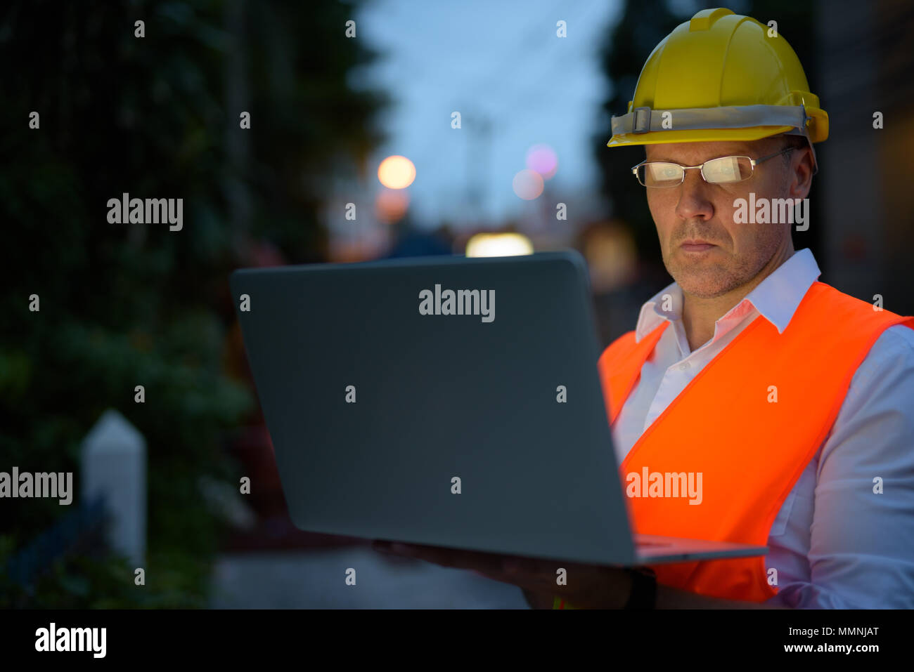 Mature man construction worker at the construction site in the c Stock ...