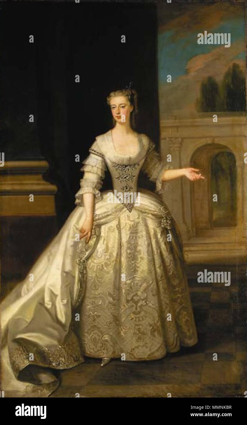 . Portrait at full-length, in a grey satin dress, beside a column ...