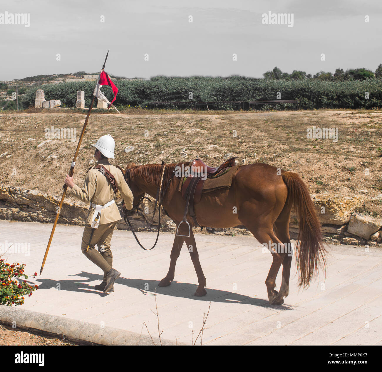 A soldier walking along with his horse symbolizing the cavalry of the ...