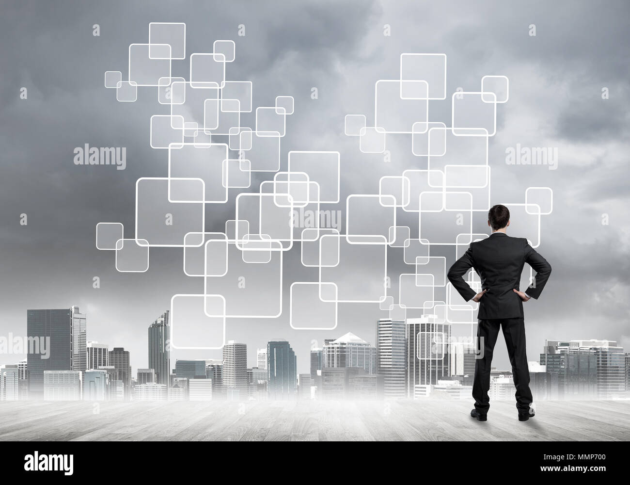 Back view of young businessman on city background with business icons ...