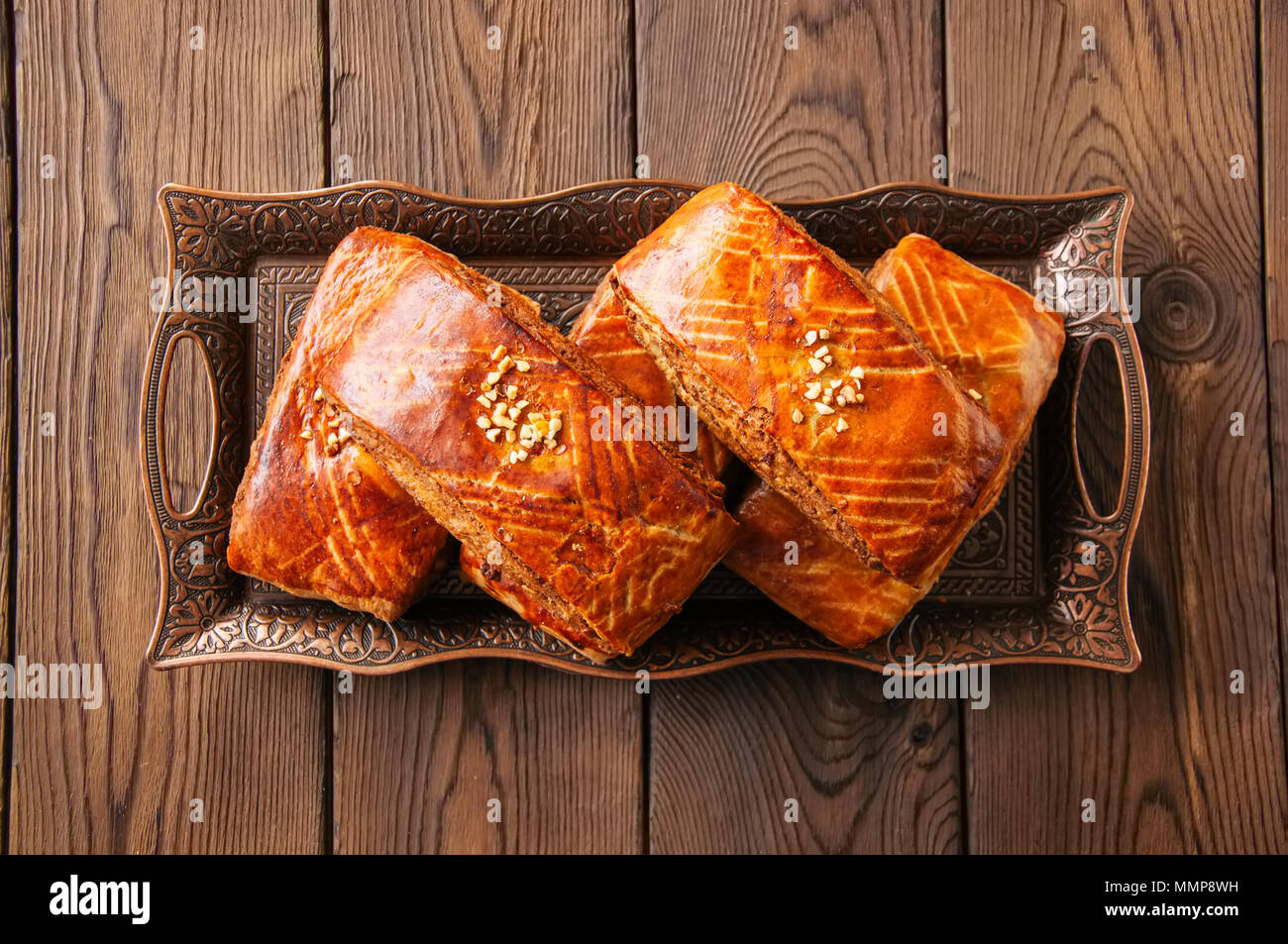 Traditional turkish pastry roll with chocolate and nuts filling ...