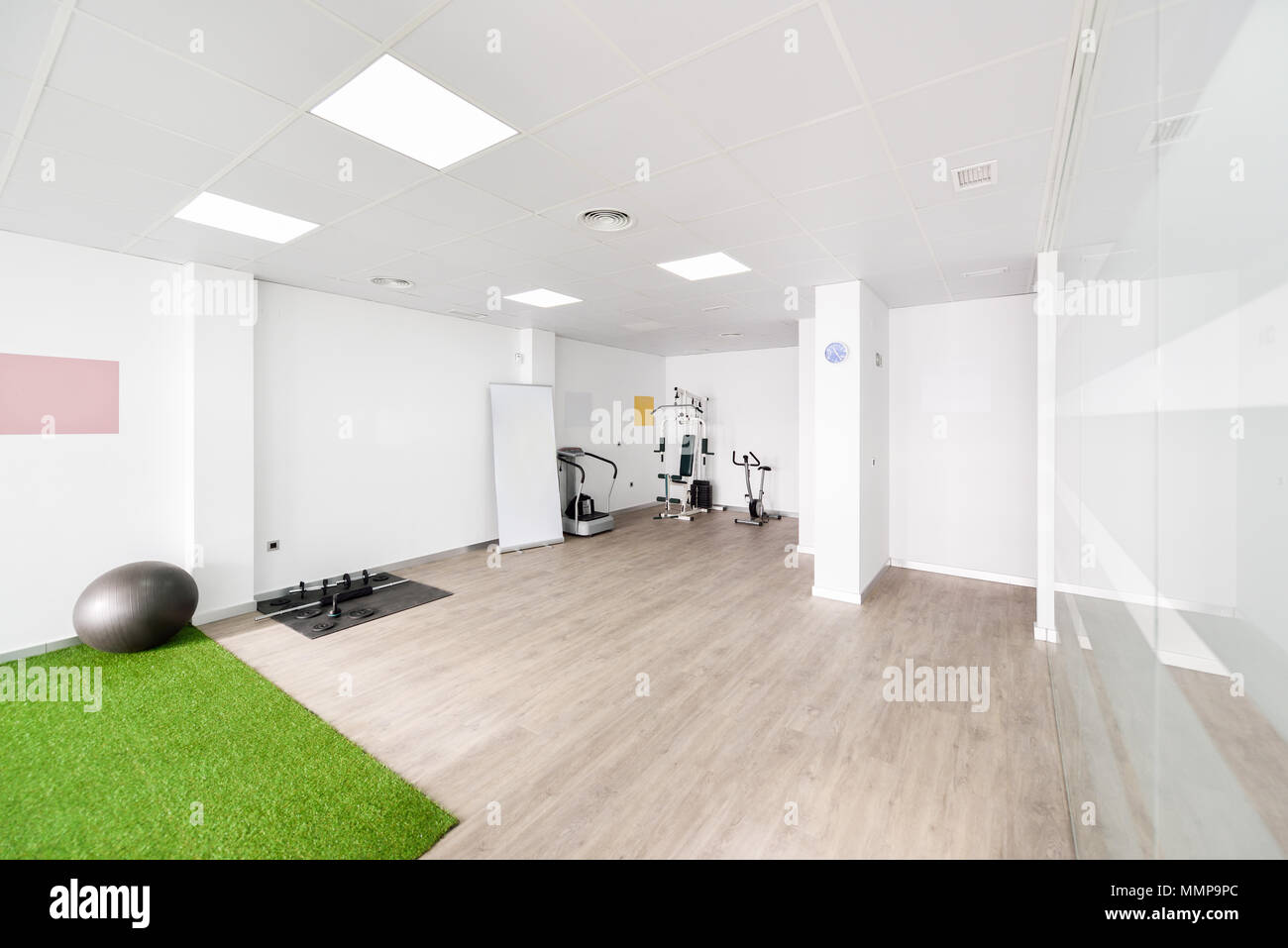 Interior of physiotherapy clinic with equipment for rehabilitation ...