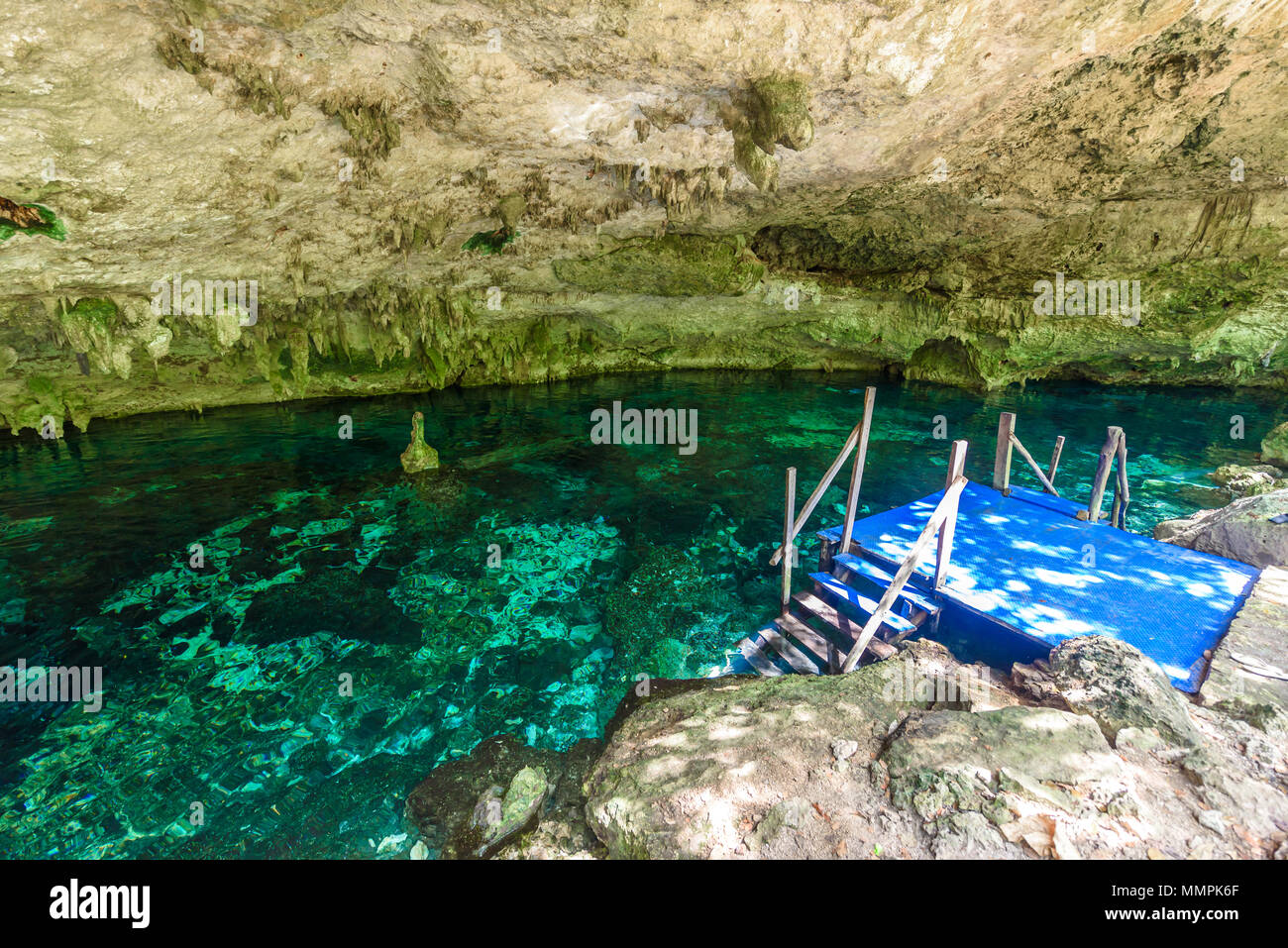 Cenote Dos Ojos in Quintana Roo, Mexico. People swimming and snorkeling ...