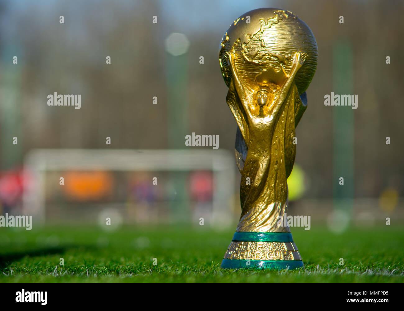 April 9, 2018 Moscow, Russia Trophy of the FIFA World Cup on the green ...