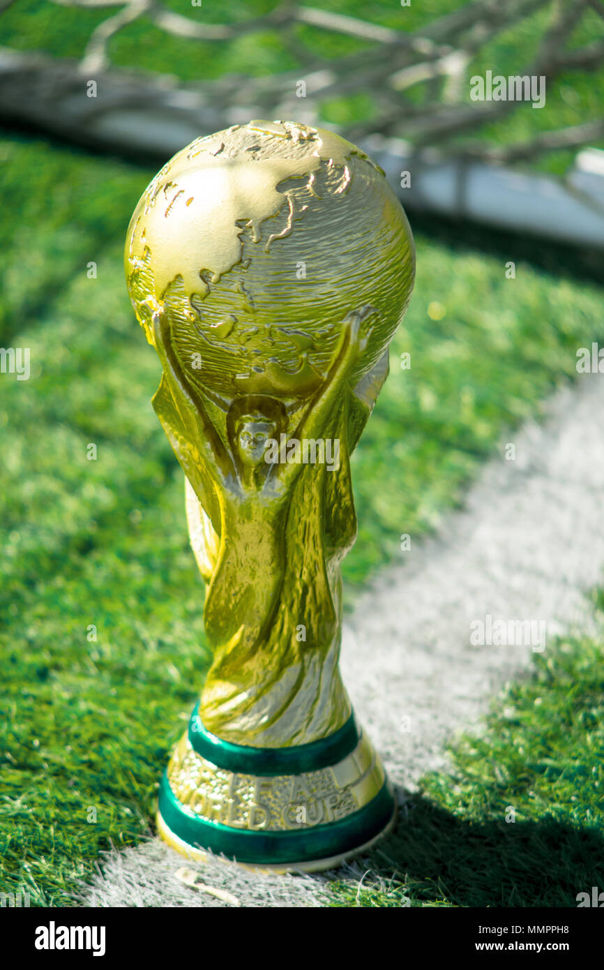 April 9, 2018 Moscow, Russia Trophy of the FIFA World Cup on the green ...