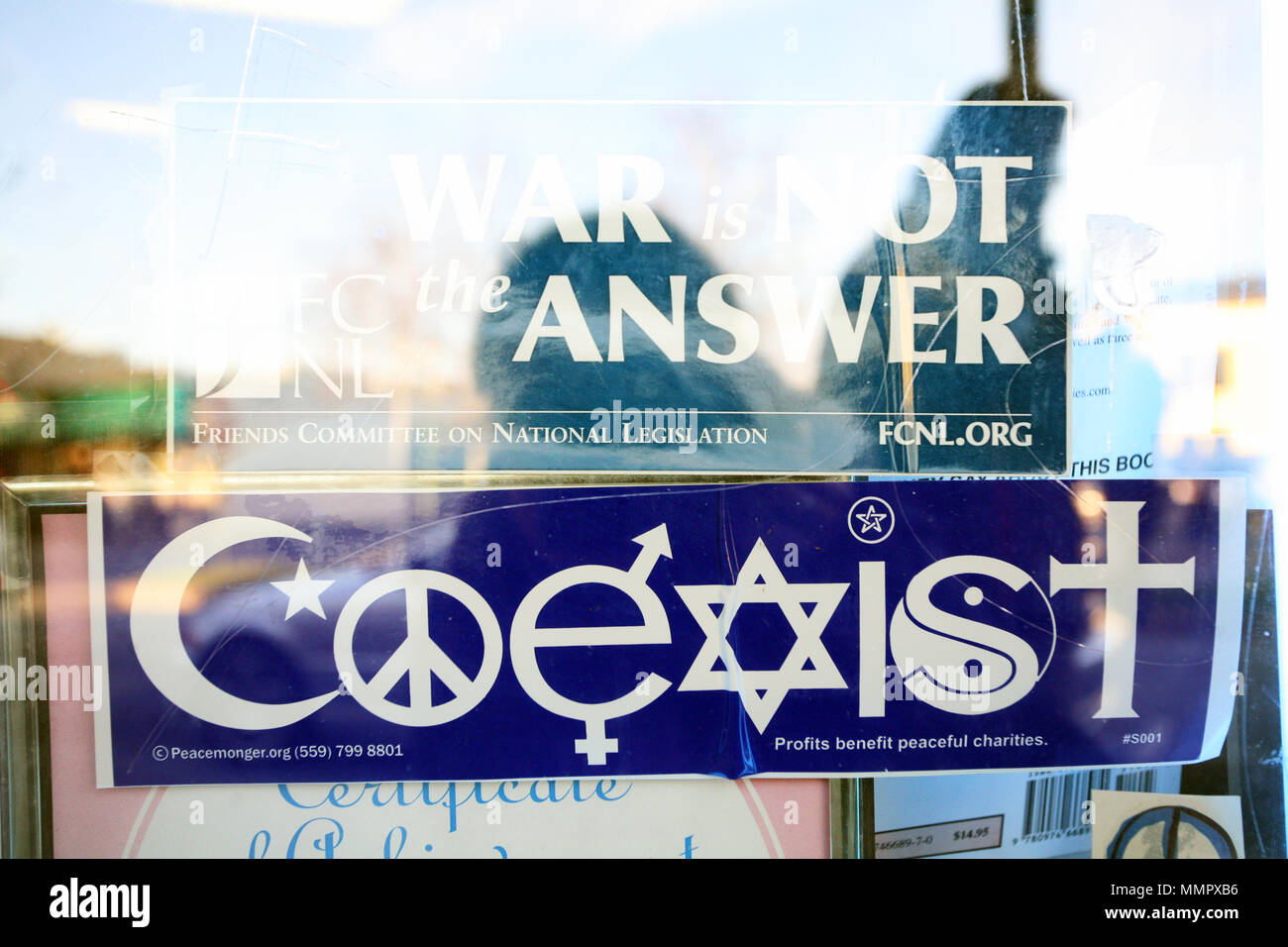 Santa Cruz, California, January 11, 2012: Coexist logo and FCNL logo in ...