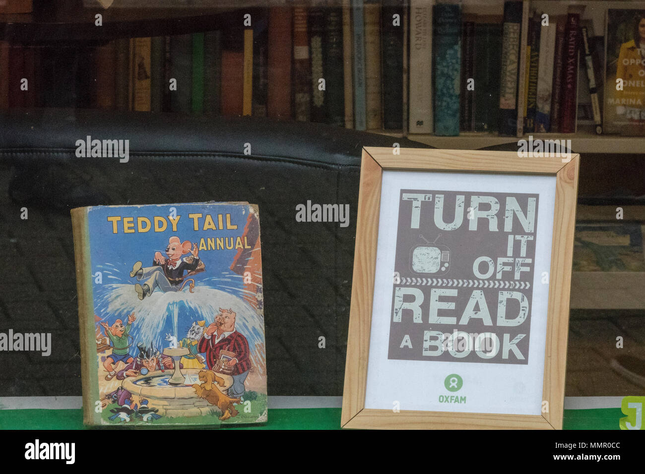 reading campaign poster in bookshop window Stock Photo - Alamy