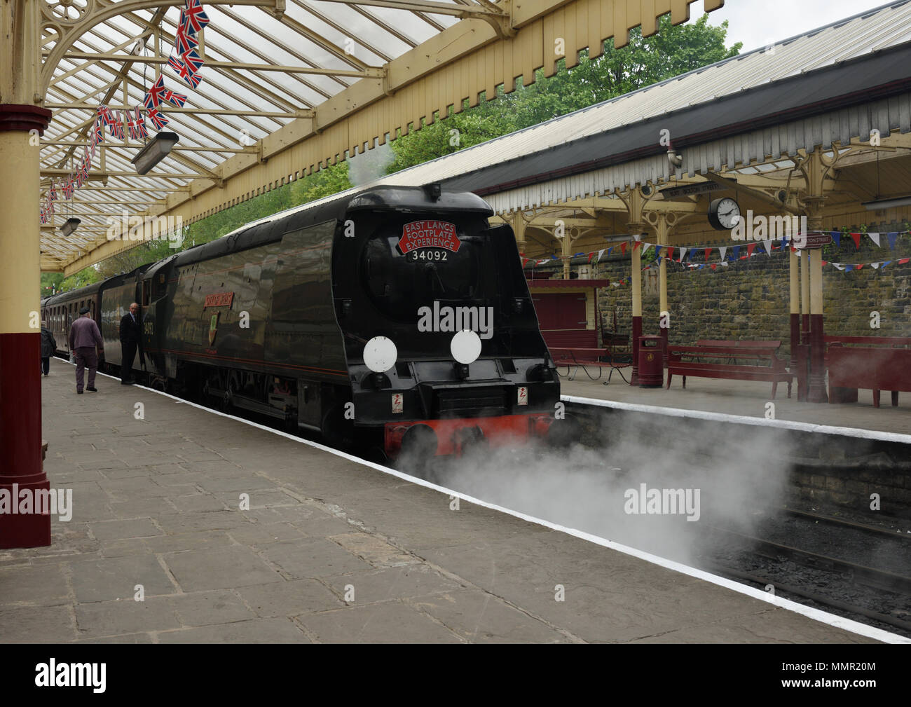 Steam train waiting to depart platform, City of wells steam locomotive ...