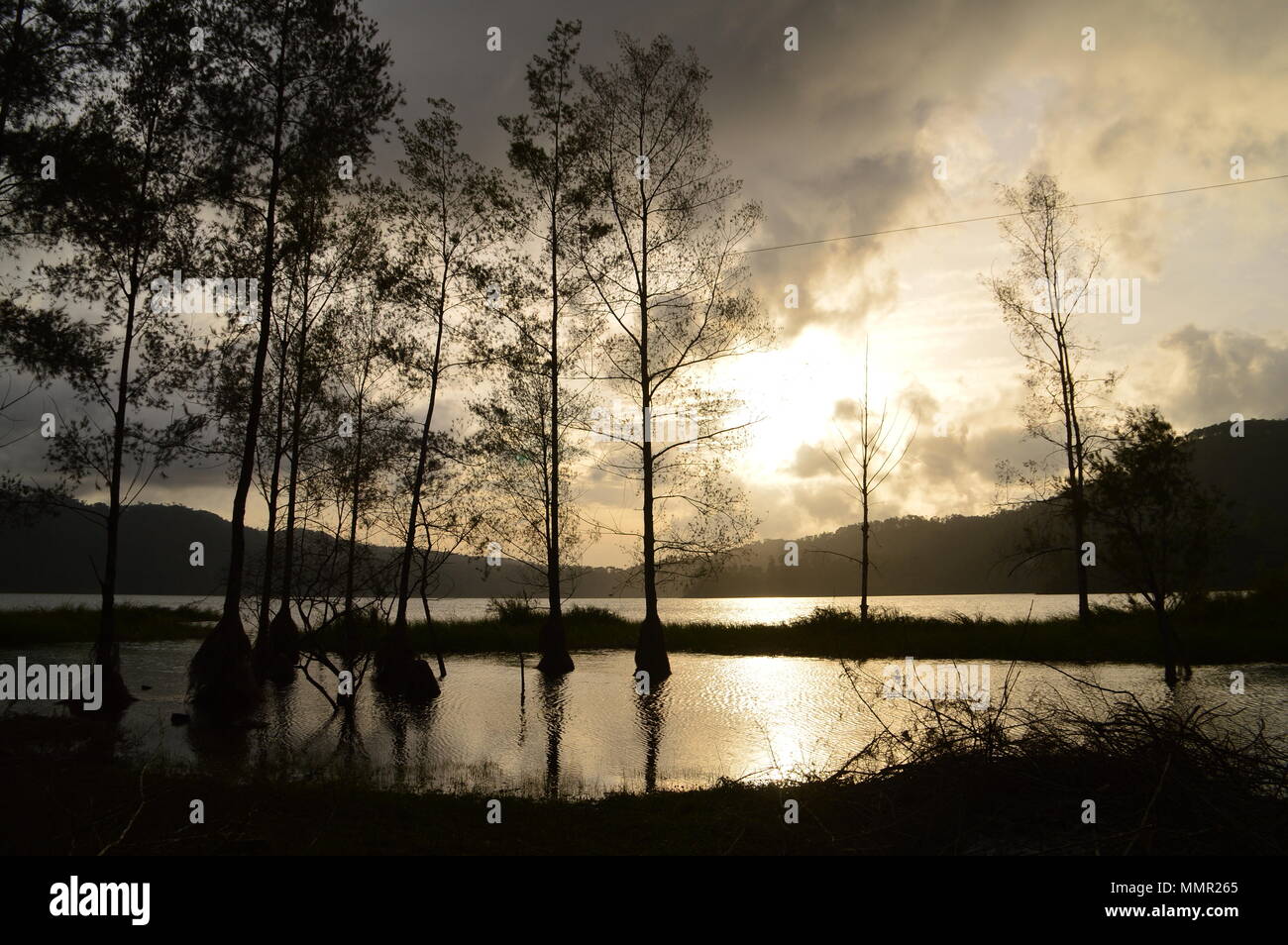 Reflective Lake At Dusk Stock Photo - Alamy