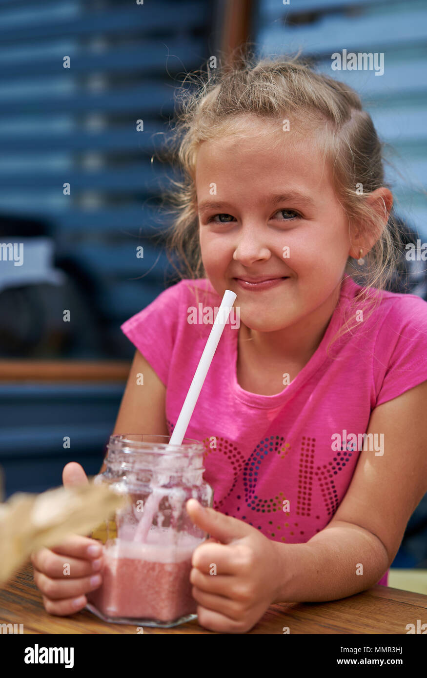 Girl drinking chocolate milkshake hi-res stock photography and images ...
