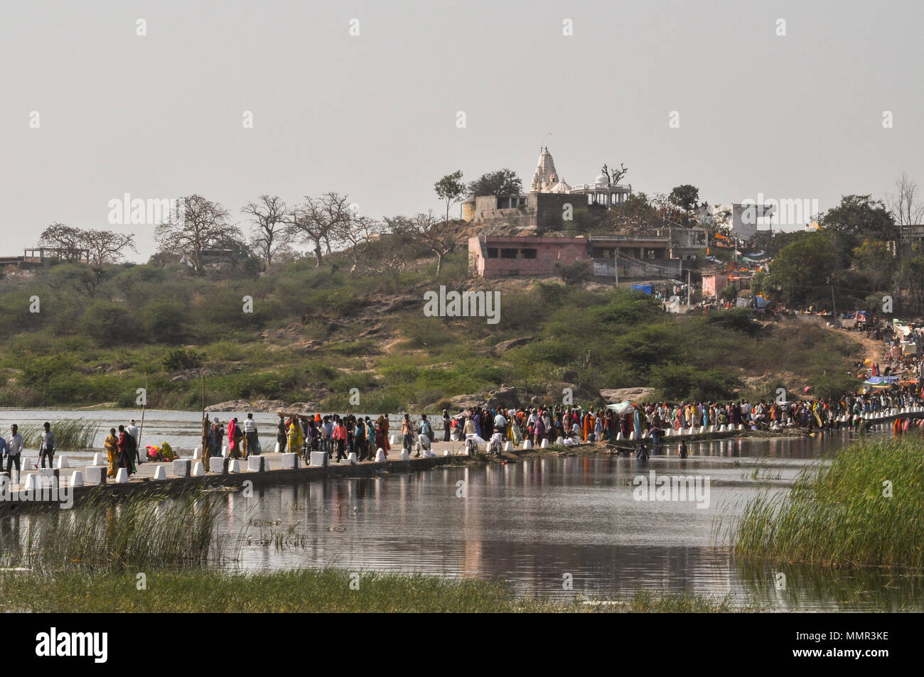 Devotees visiting temple hi-res stock photography and images - Alamy