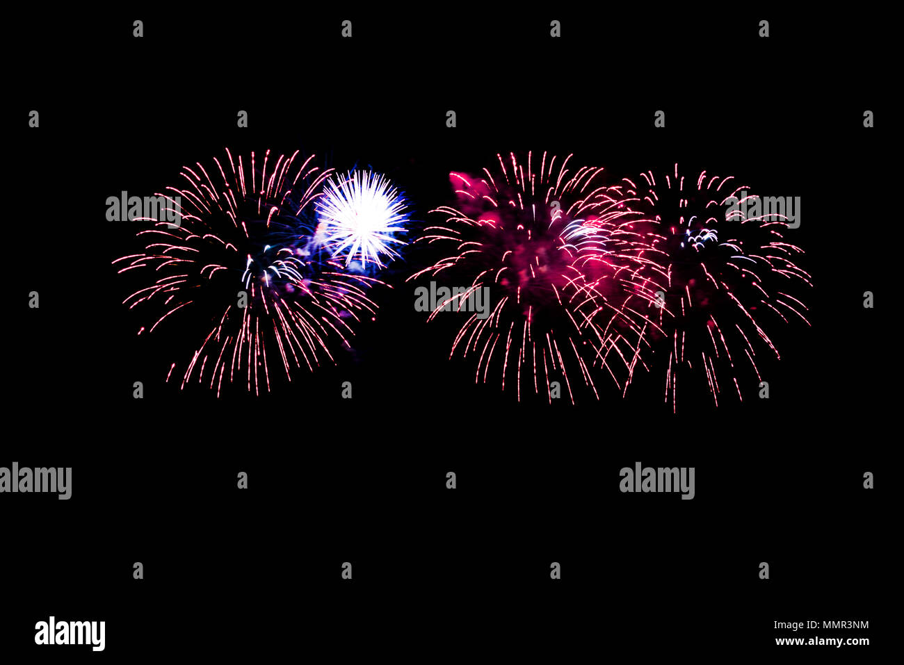 Colorful explosions of festive fireworks in the night sky Stock Photo ...