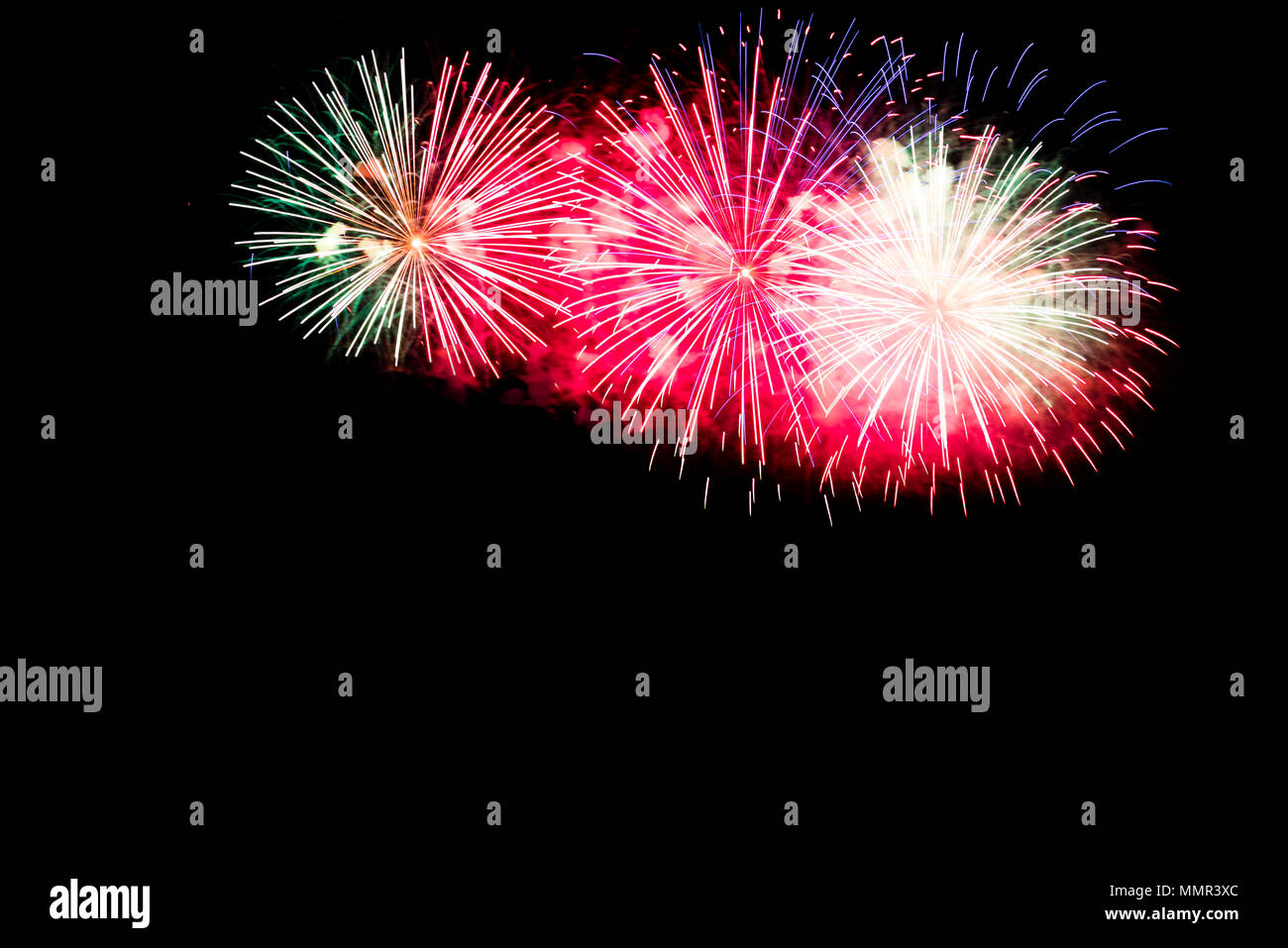 Colorful explosions of festive fireworks in the night sky Stock Photo ...
