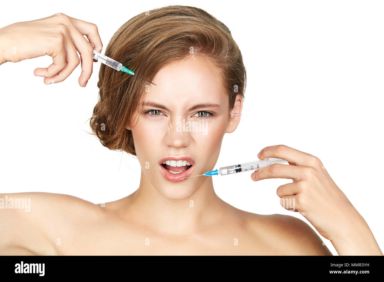 beautiful young woman making beauty injection. studio shot isolated on ...