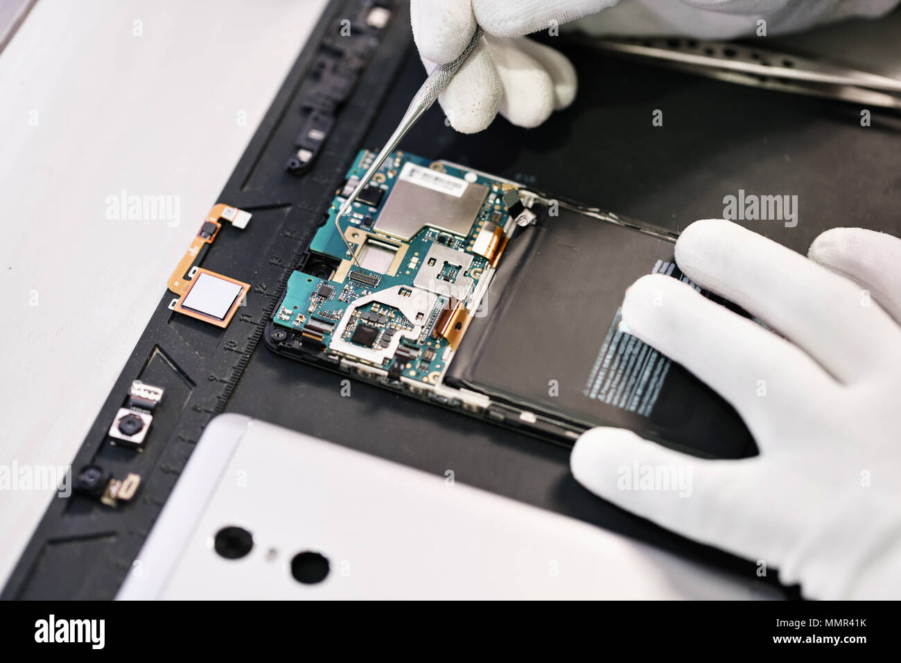 Technician with a screwdriver for fixing computers hi-res stock ...