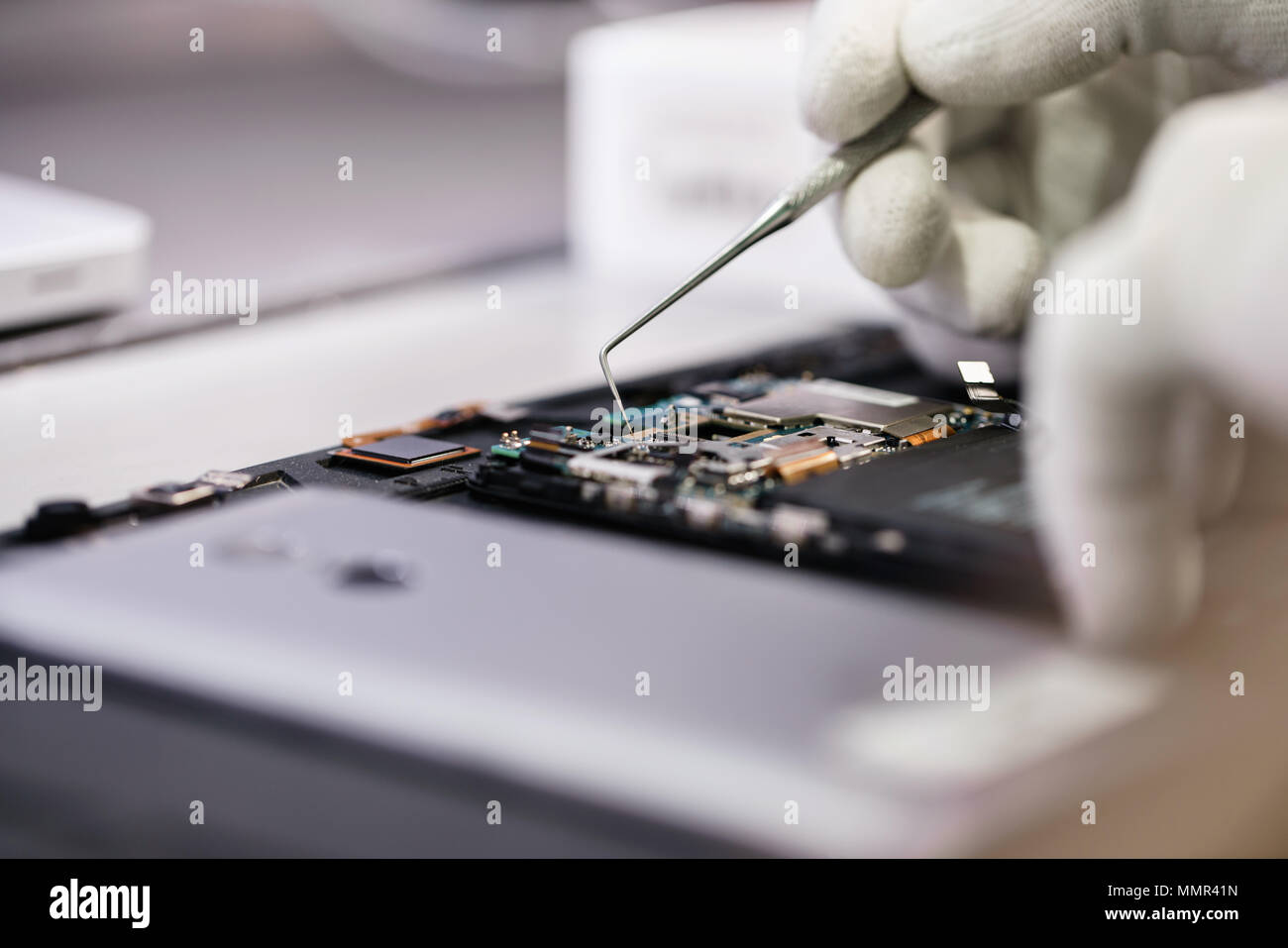 Technician with a screwdriver for fixing computers hi-res stock ...