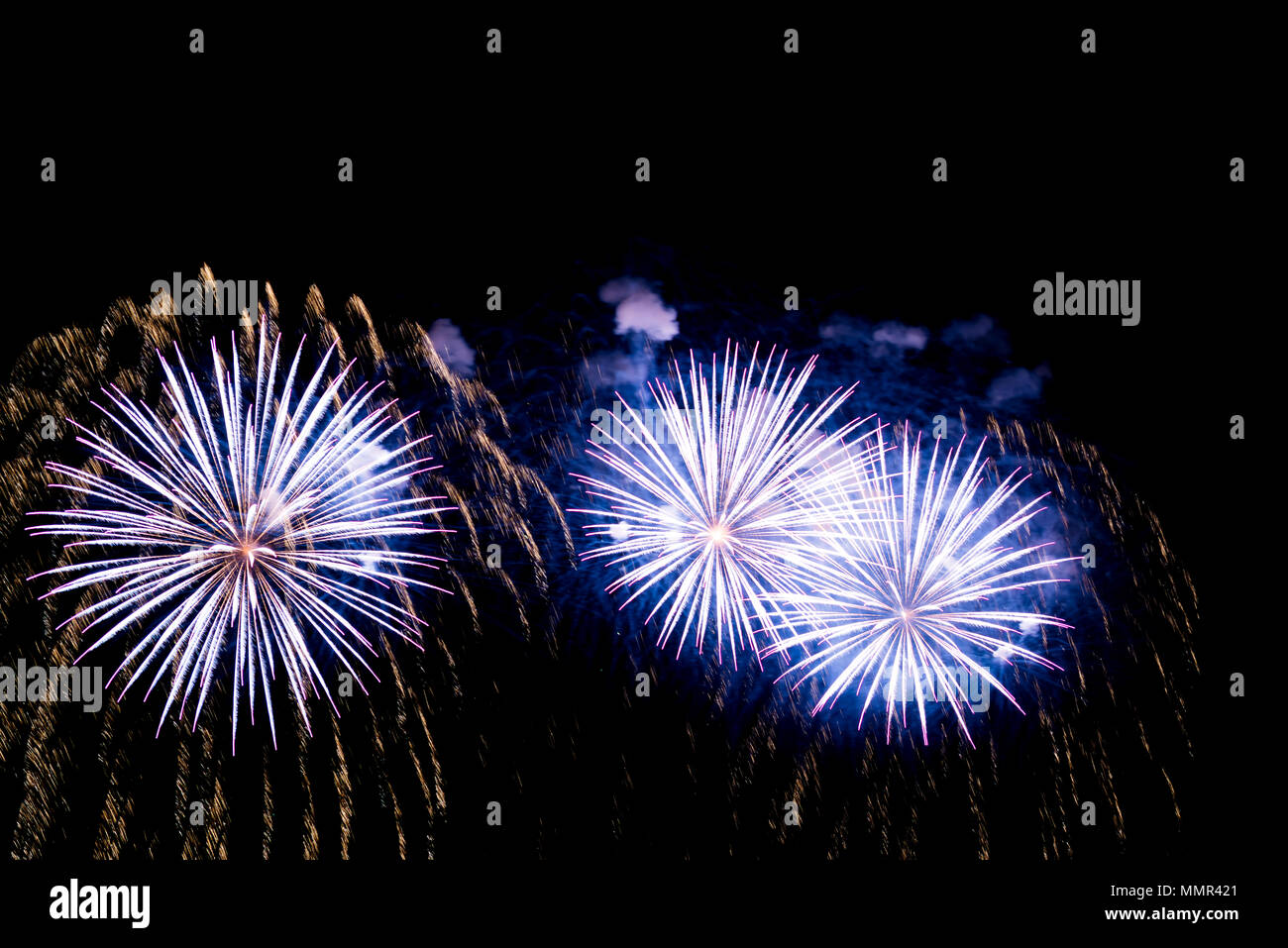 Colorful explosions of festive fireworks in the night sky Stock Photo ...