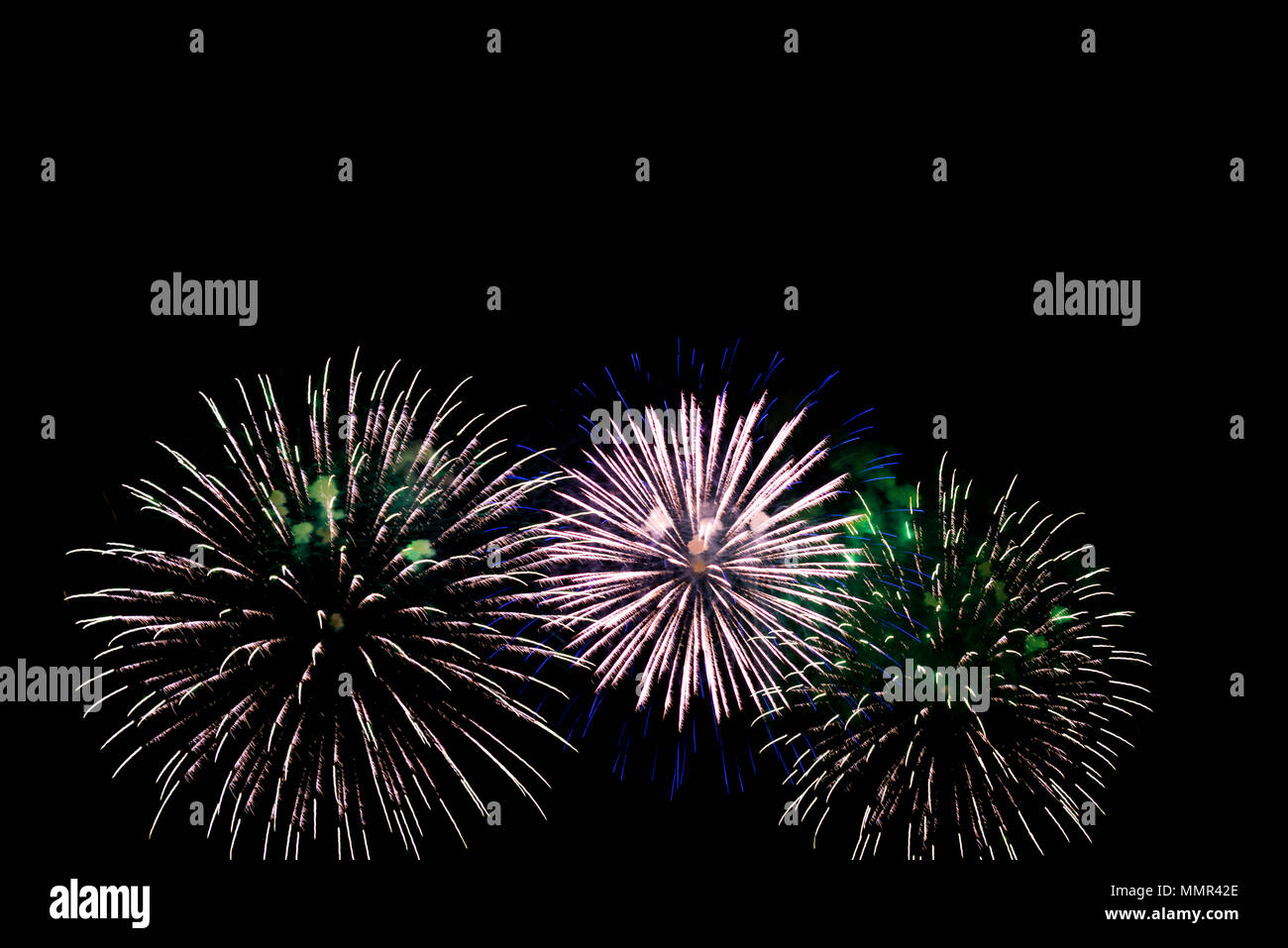 Colorful explosions of festive fireworks in the night sky Stock Photo ...