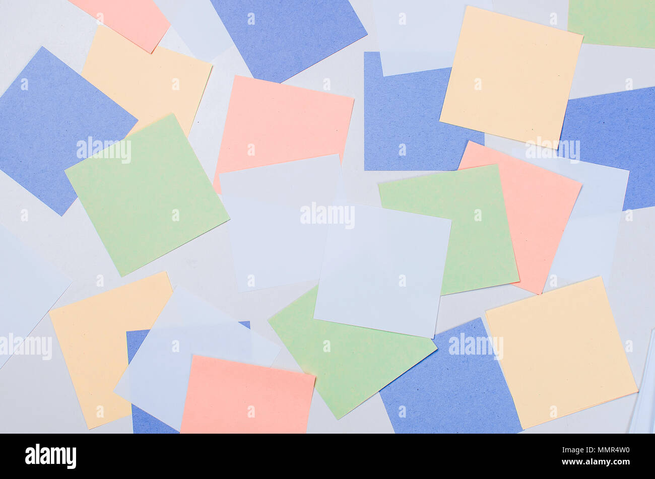 lot of various colored note papers on white background Stock Photo - Alamy