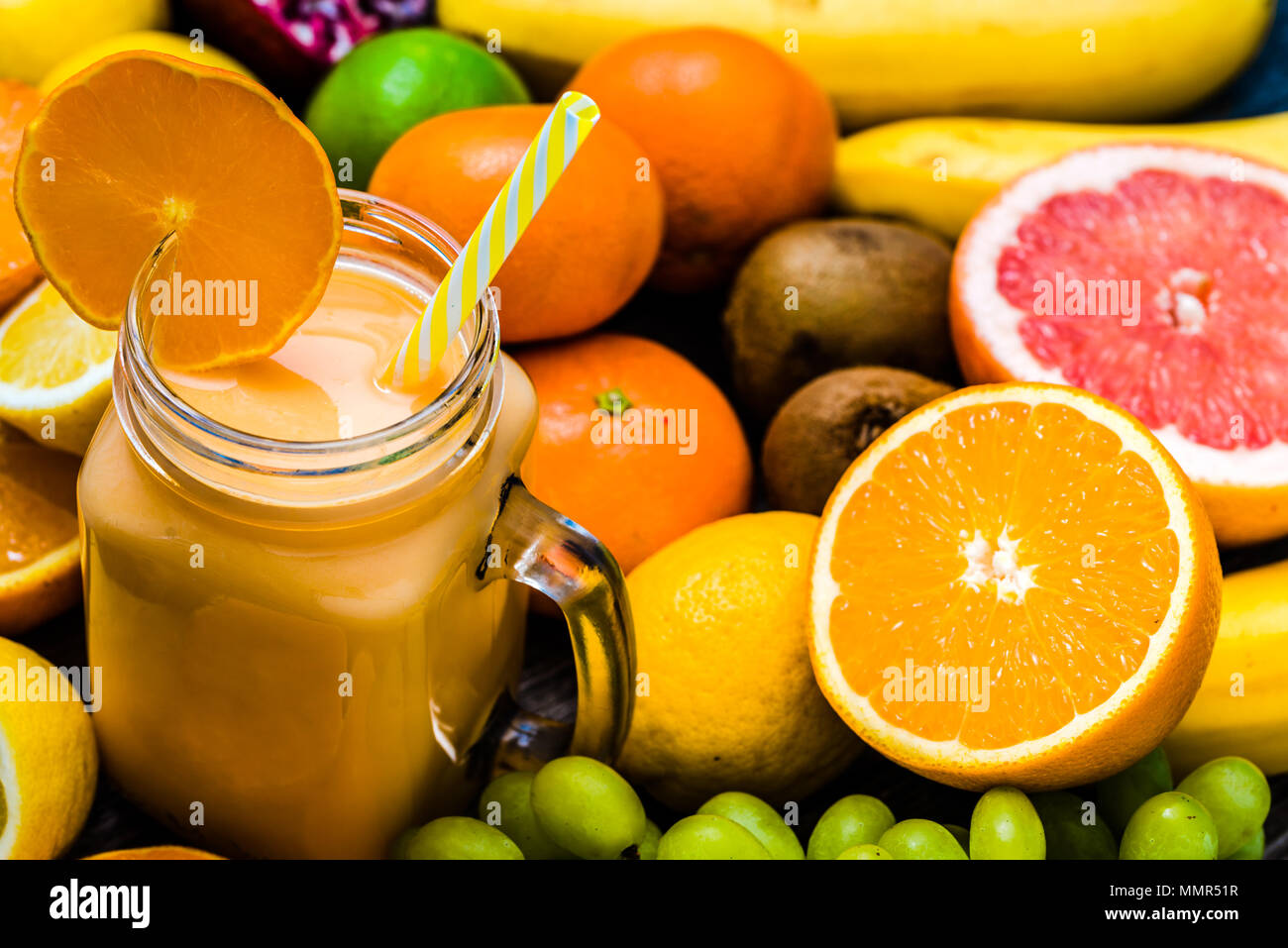 Healthy smoothie with tropical fruit, drink with fresh fruits mix ...