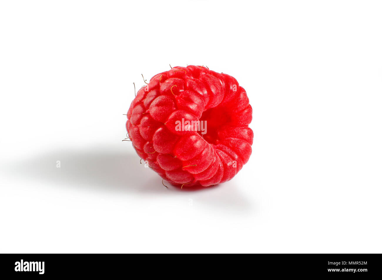 Single raspberry isolated on white background Stock Photo - Alamy