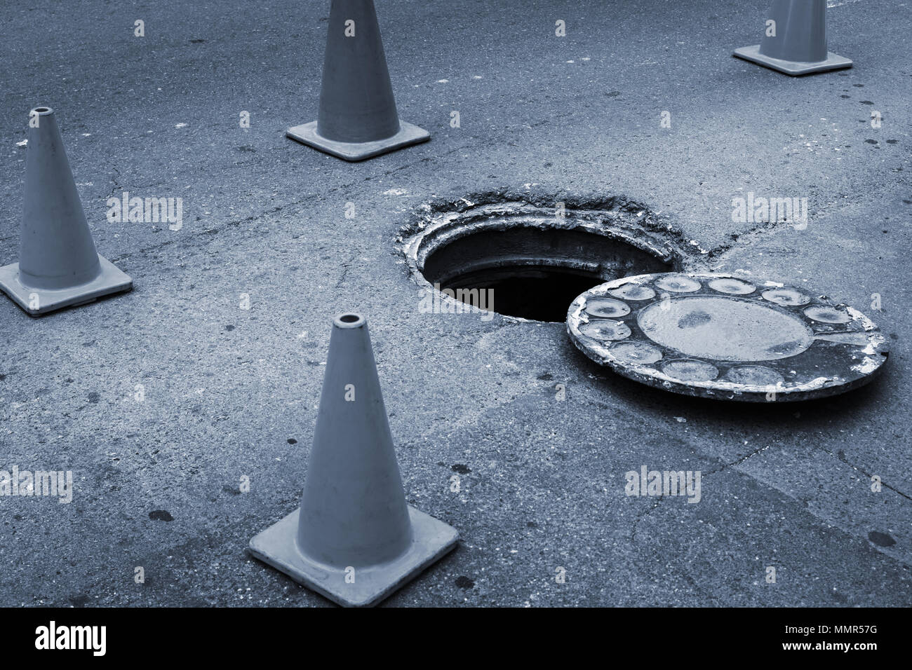 Manhole opening hi-res stock photography and images - Alamy
