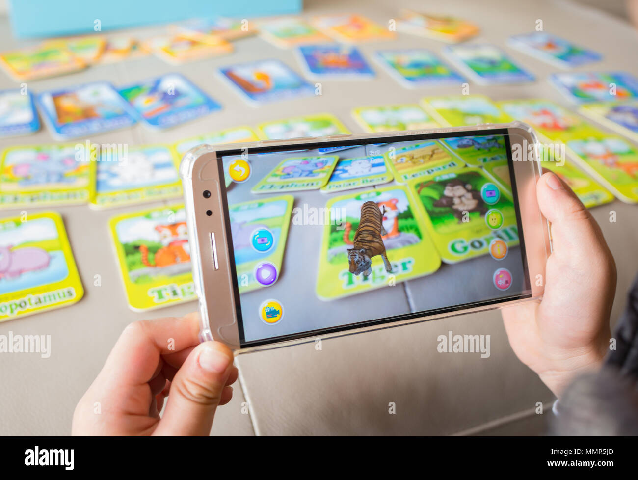 Zhongshan,China-December 30, 2017:kid playing Augmented Reality popup ...