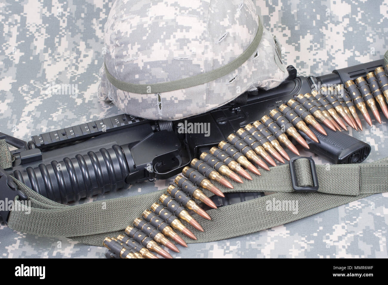 M4 carbine, kevlar helm on us army camouflage uniform Stock Photo - Alamy