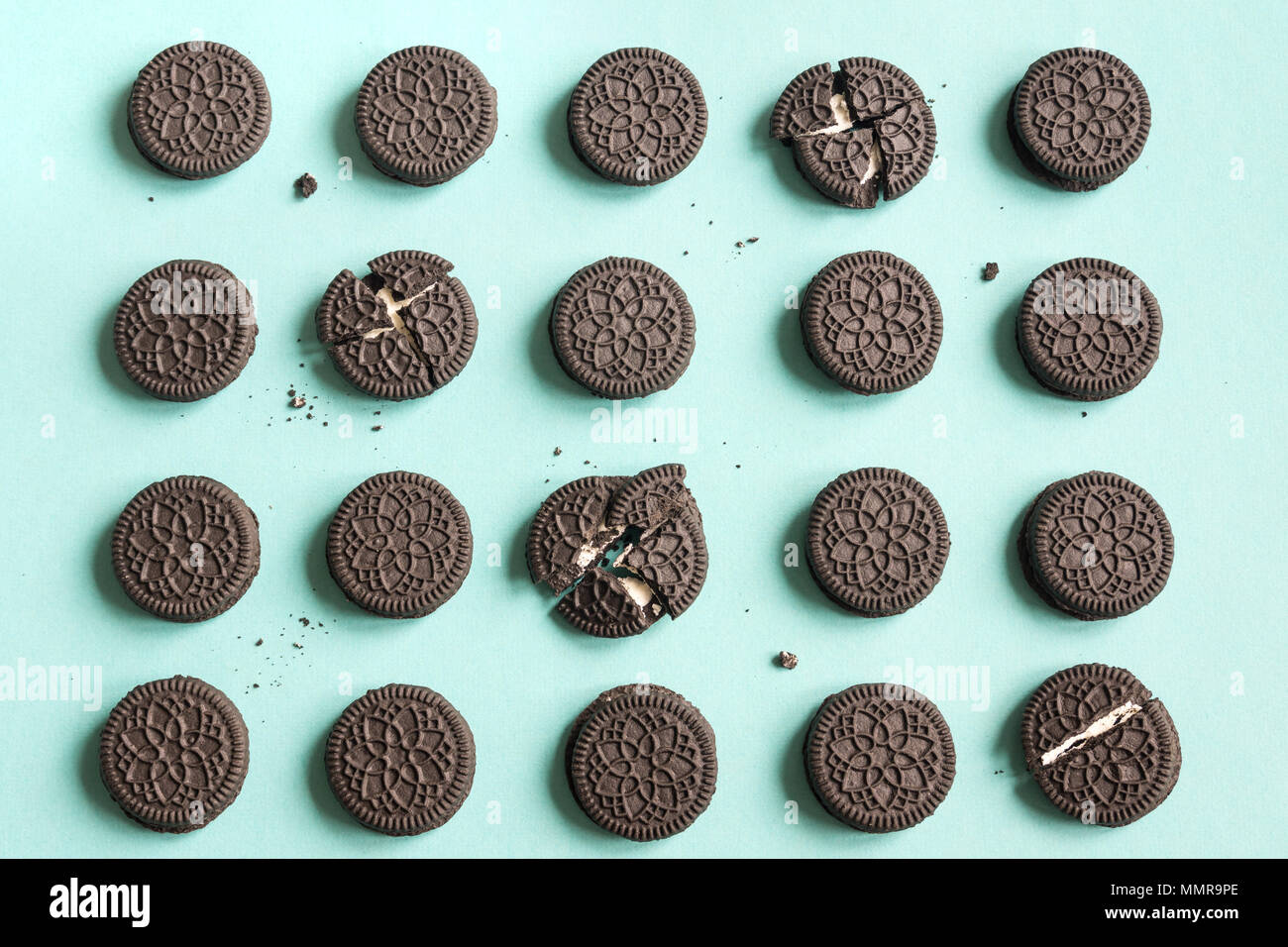 Oreo (chocolate and cream) cookies on blue pastel background, top view ...