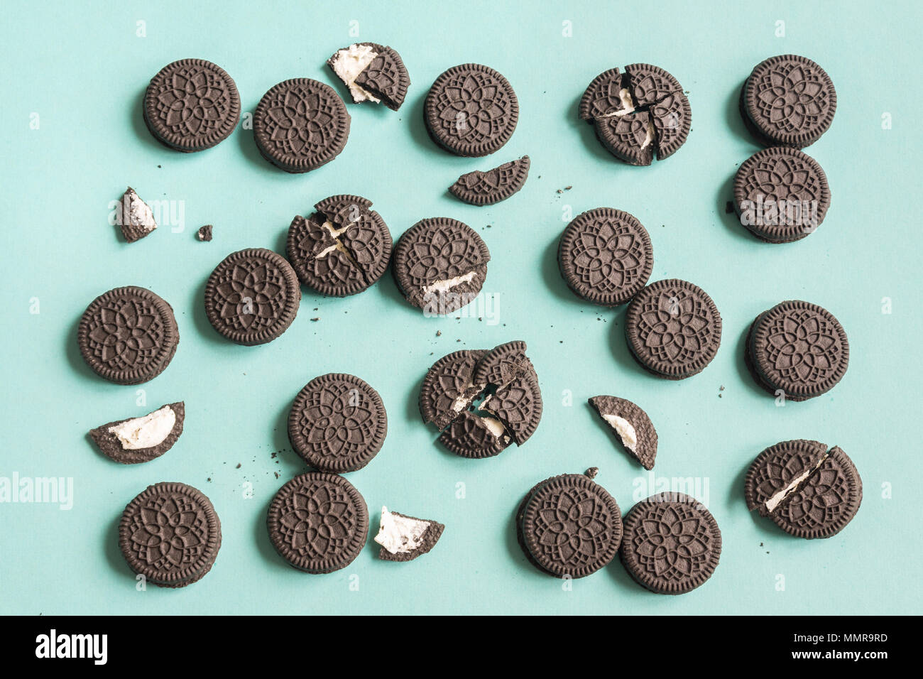 Oreo (chocolate and cream) cookies on blue pastel background, top view ...