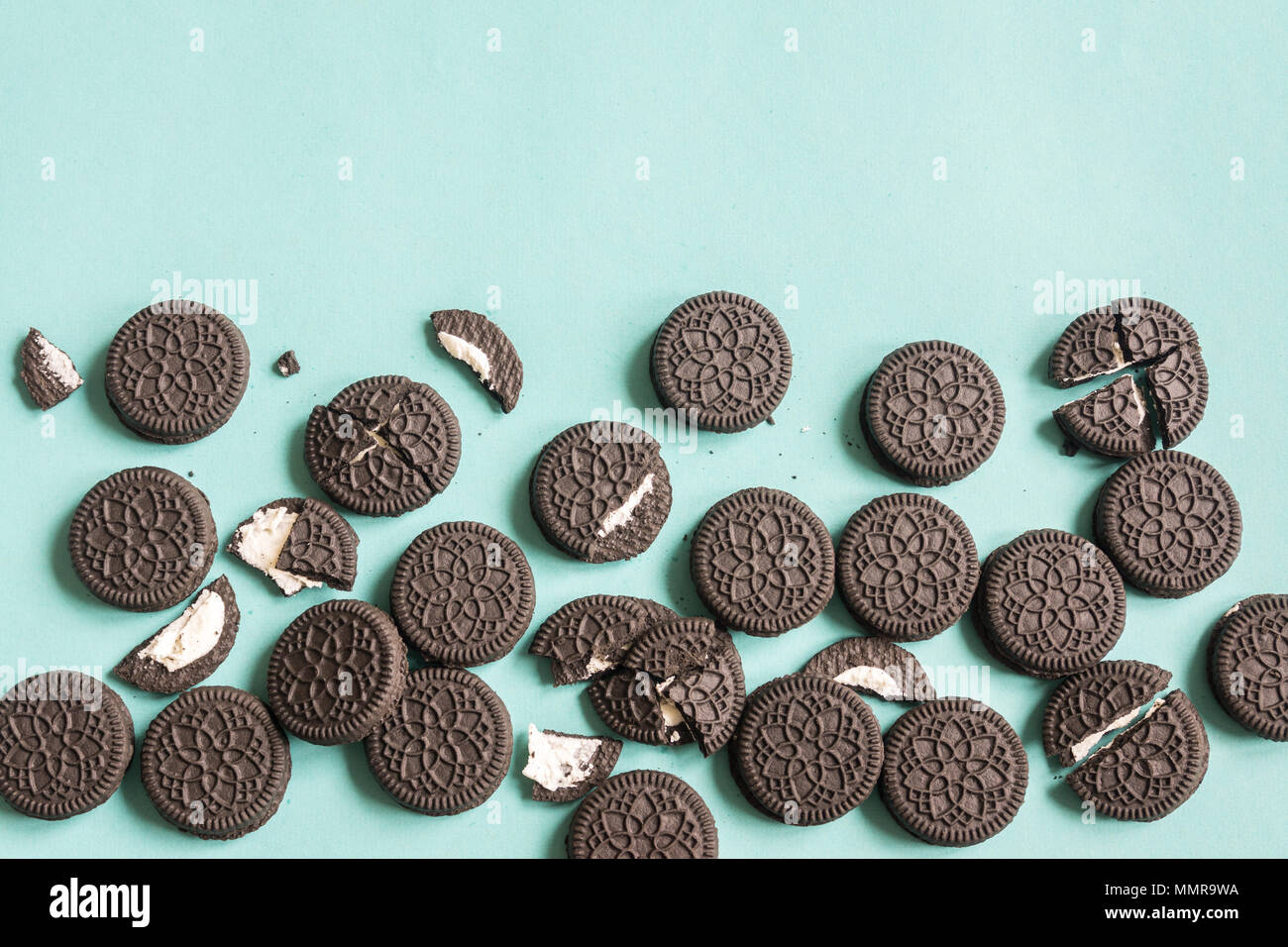 Oreo (chocolate and cream) cookies on blue pastel background, top view ...