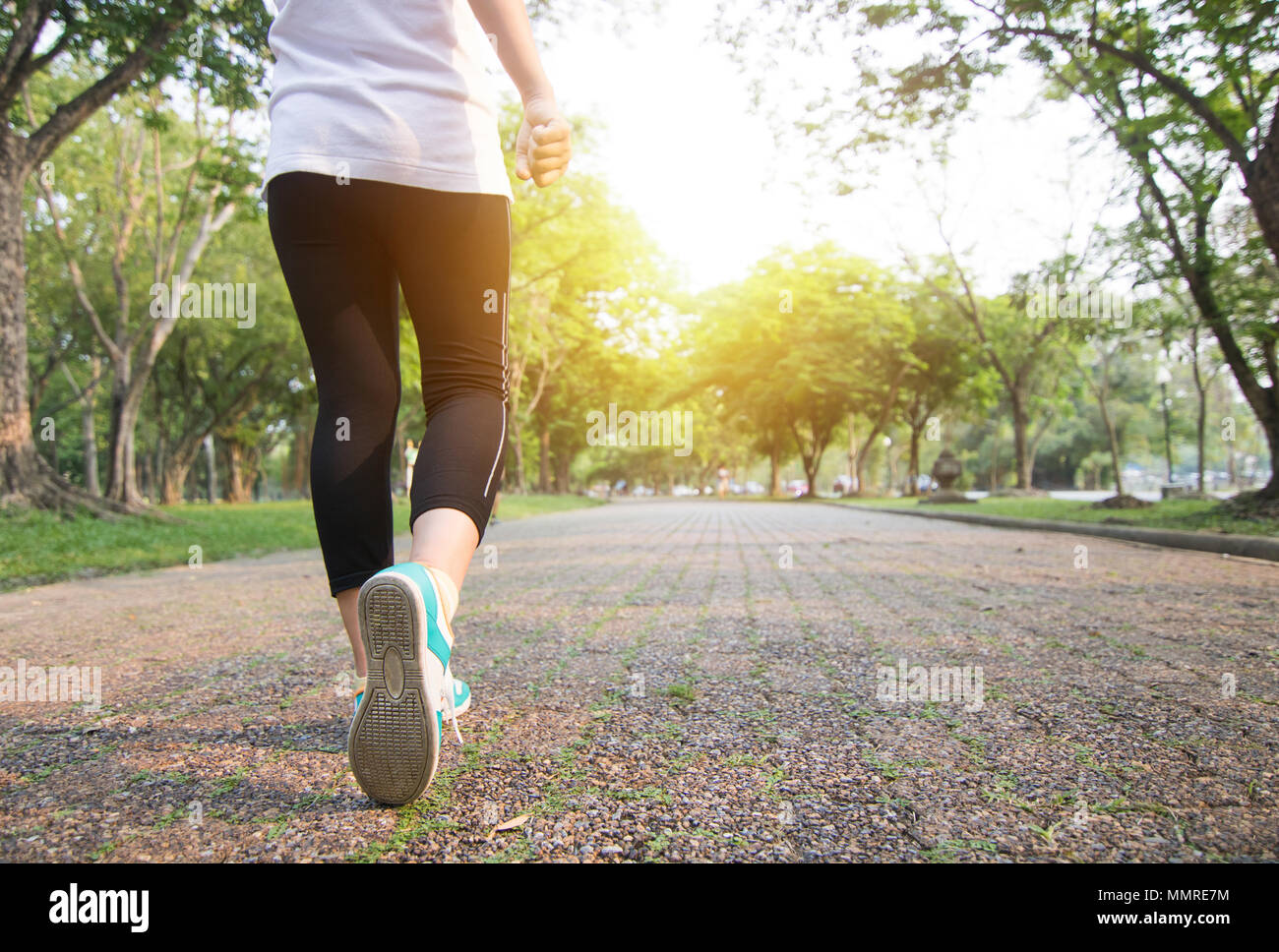 runner running in park, exercirse and relax concept Stock Photo - Alamy