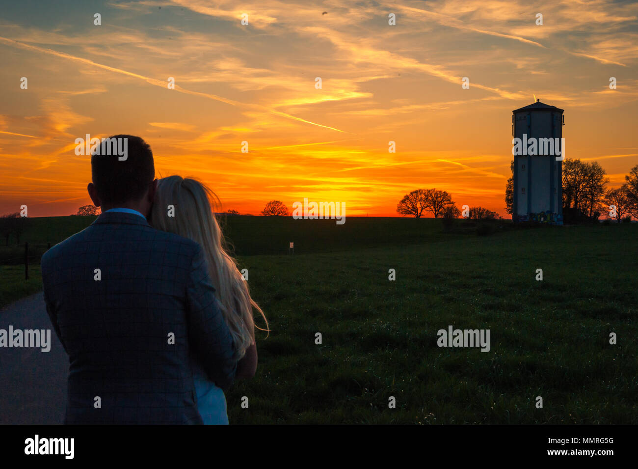 Person watching sunset hi-res stock photography and images - Alamy