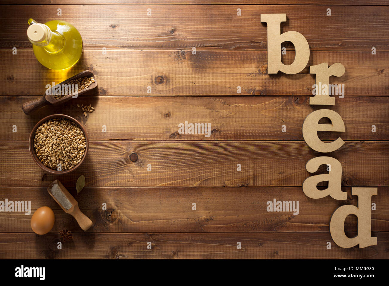 bread and bakery products on wood background Stock Photo - Alamy