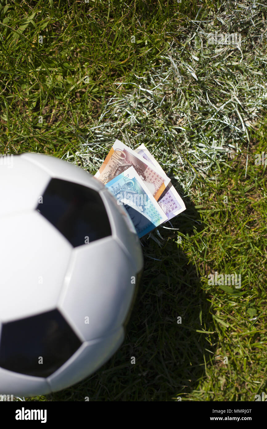 Football money hi-res stock photography and images - Alamy