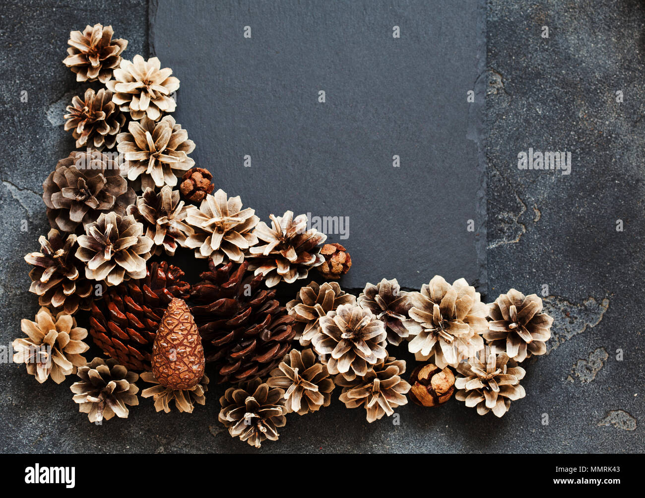 Autumn pine corn frame on slate background from above Stock Photo - Alamy