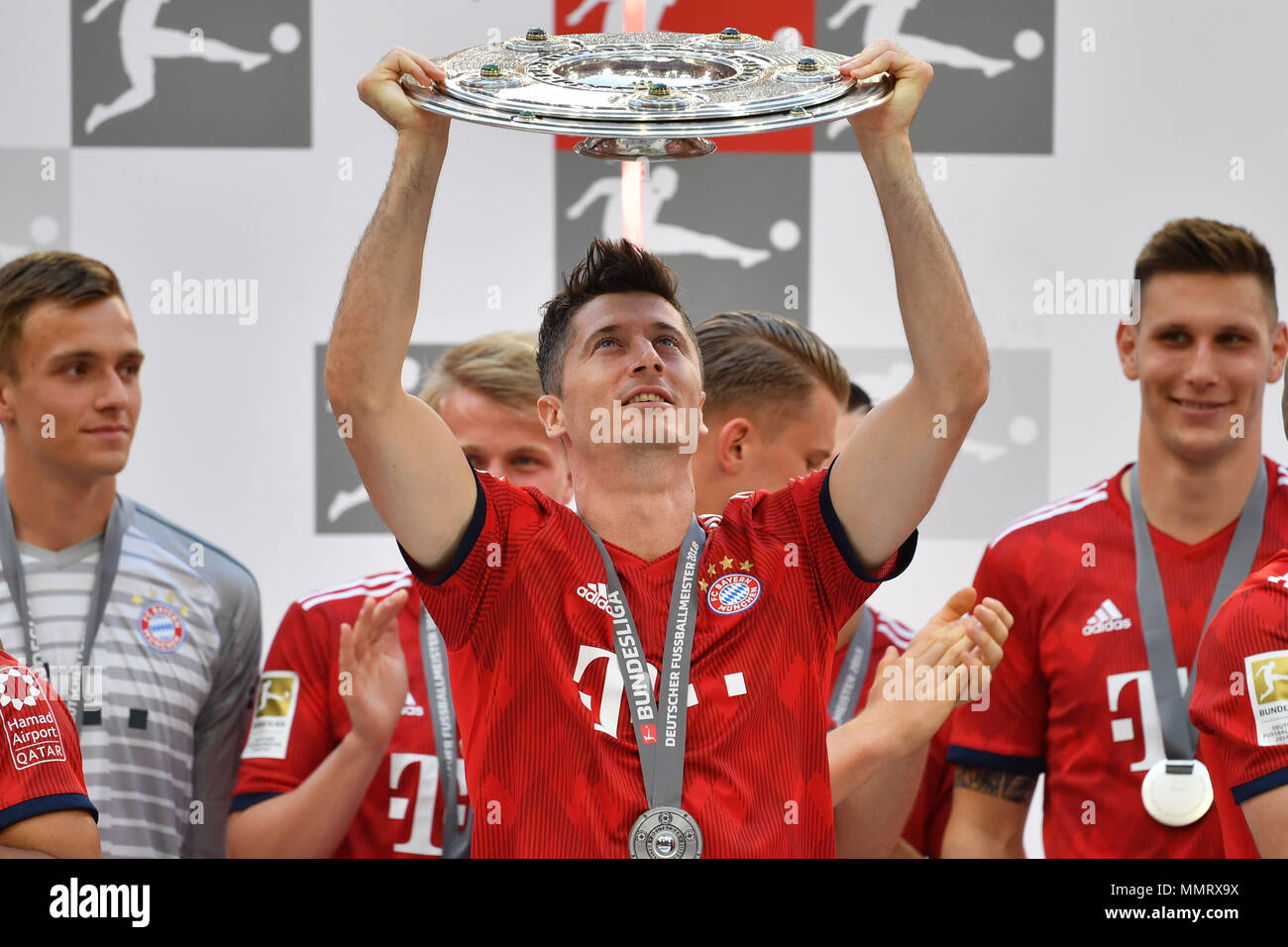 Robert LEWANDOWSKI (FC Bayern Munich) with shell, championship trophy ...