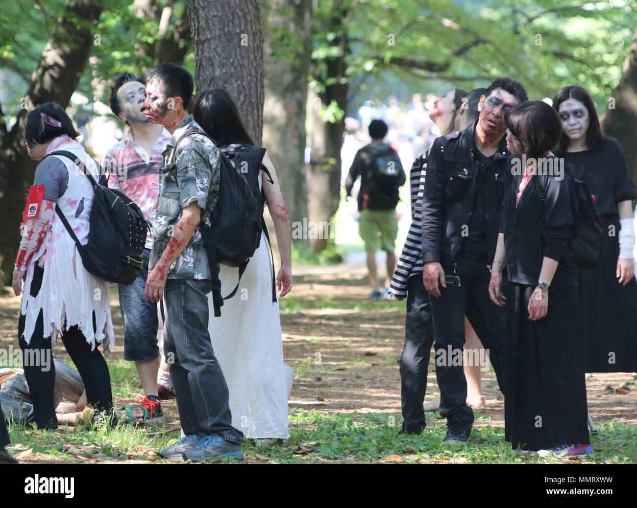 Tokyo, Japan. 12th May, 2018. Participants take part in a "zombie walk ...