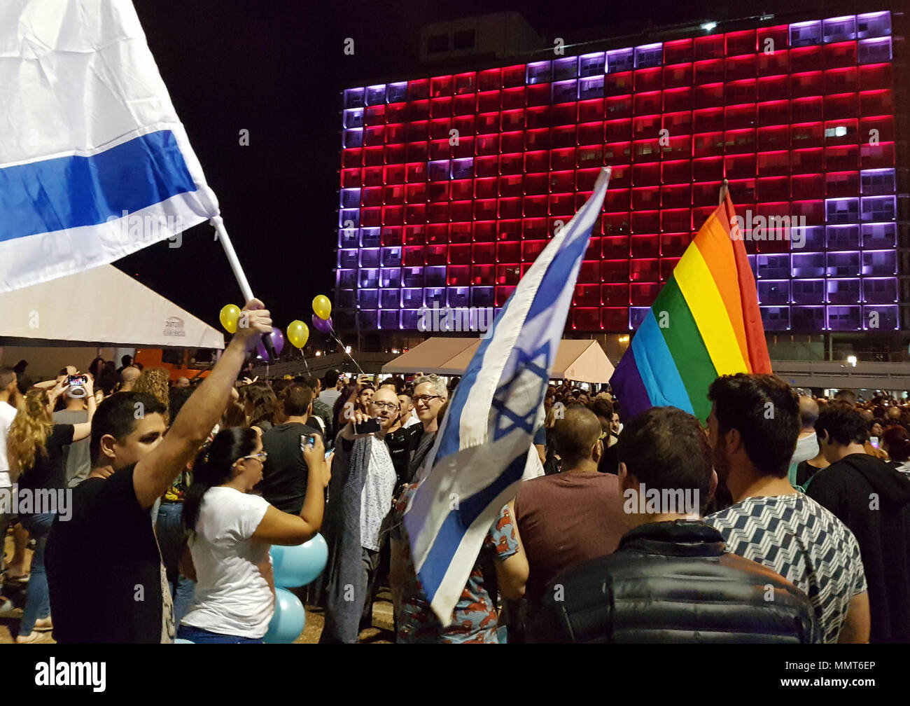 13 May 2018, Israel, Tel Aviv: Fans celebrate Israeli singer Netta ...