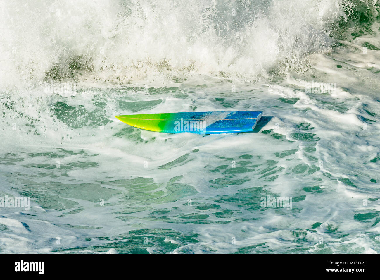 Surfboard Floating In Water